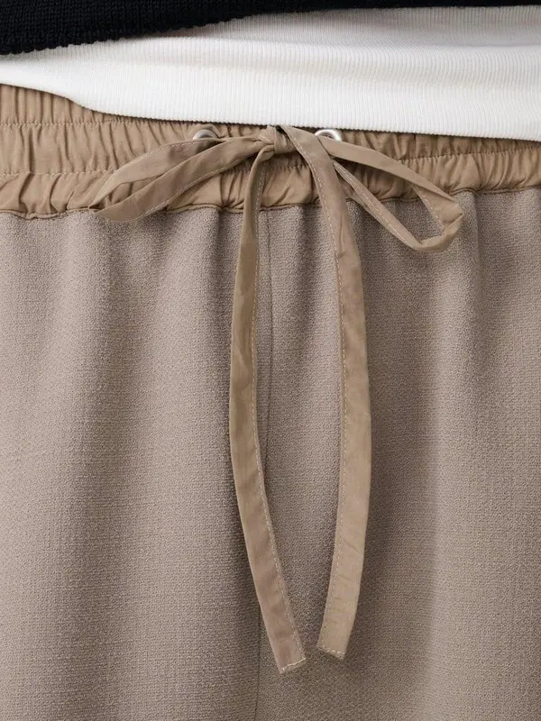 Studio Nicholson Prince Of Wales Wool Baggy Trousers With Drawstring - Beige