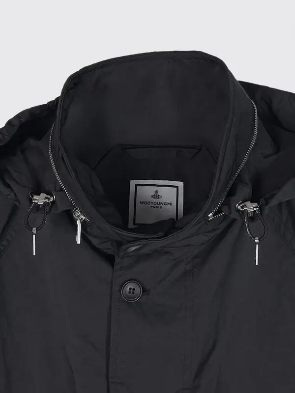 WOOYOUNGMI Hooded Windbreaker Jacket With A High Neck And Button Closure