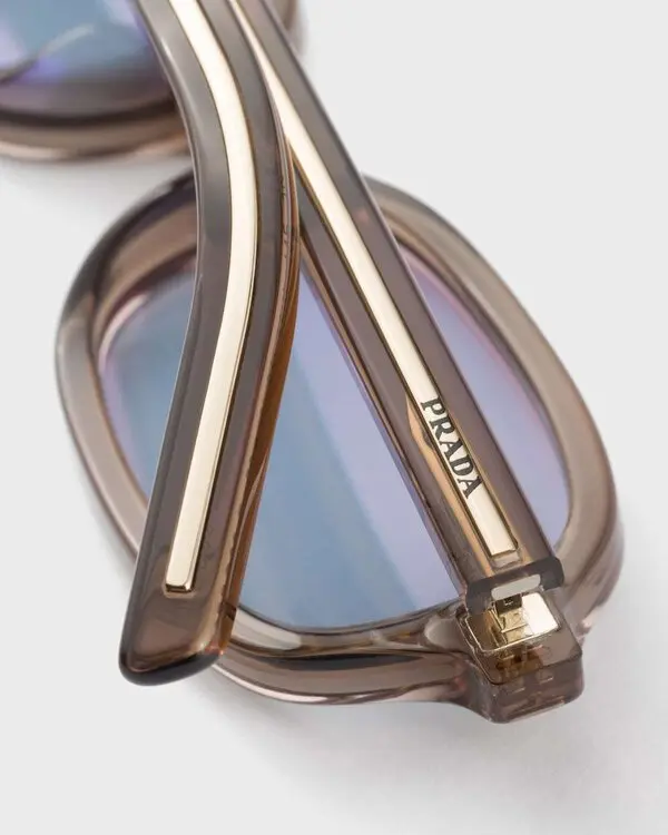 Prada Sunglasses With The Iconic Metal Plaque