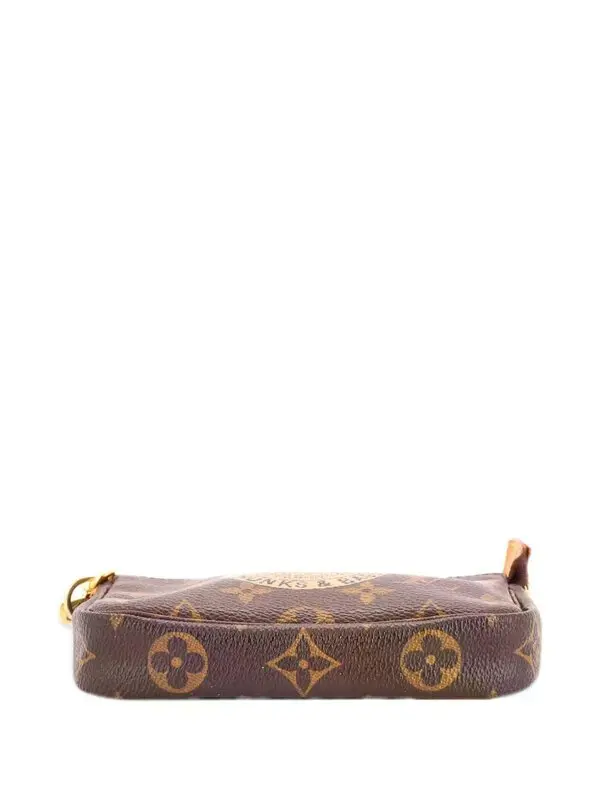 LOUIS VUITTON Pochette Accessoires Limited Edition Monogram Canvas Mini Clutch Bag