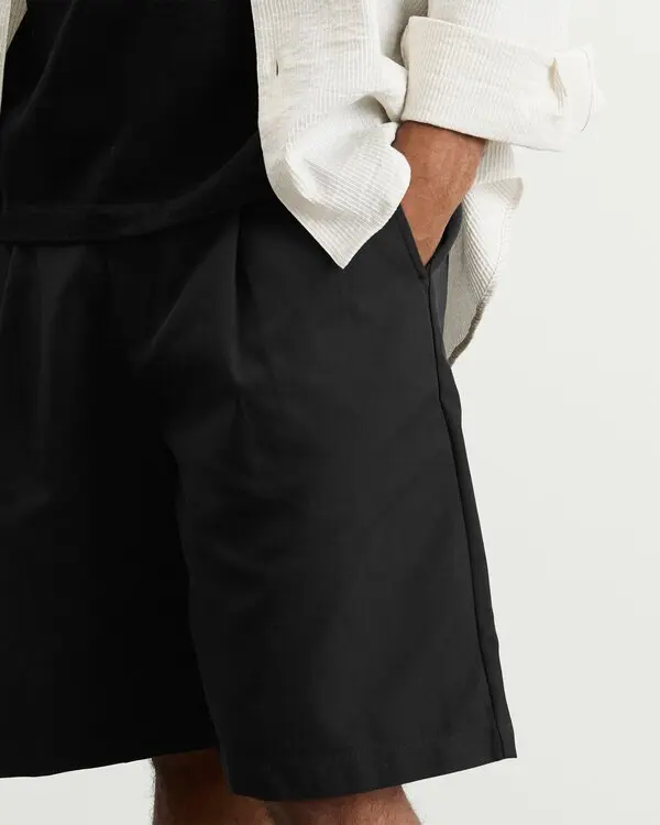 BOUND Wide Pleated Cotton Shorts