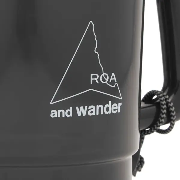 AND WANDER X Roa Logo Mug