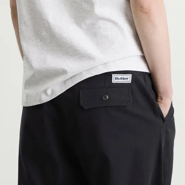BUTTER GOODS Pleated Trousers