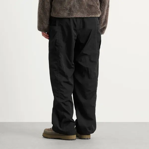 AND WANDER Crinkled Nylon Trousers