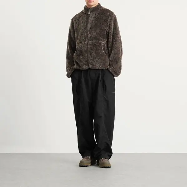 AND WANDER Crinkled Nylon Trousers