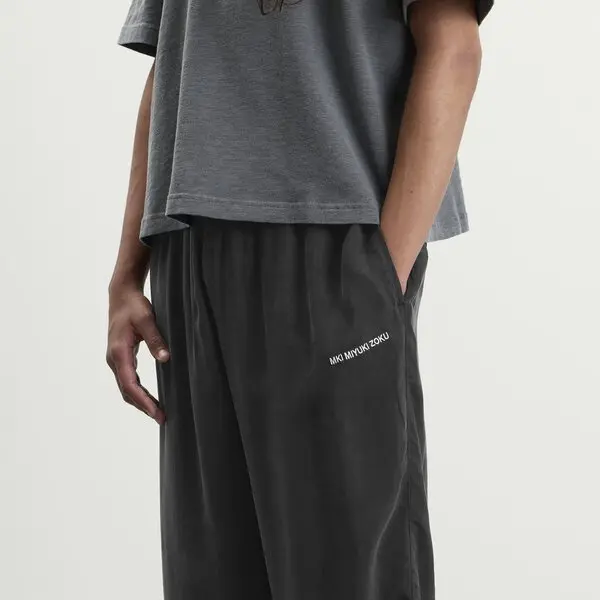 MKI MIYUKI ZOKU Ribbed Cupro Wide Leg Pants