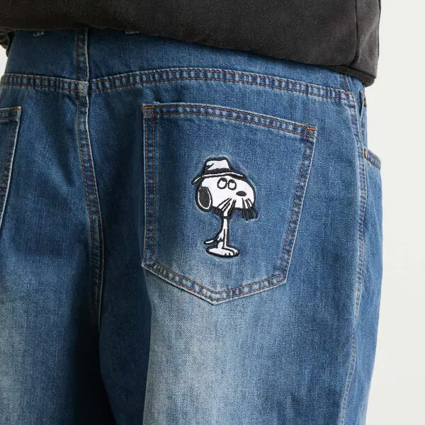 BUTTER GOODS X Peanuts Spike Denim Jeans