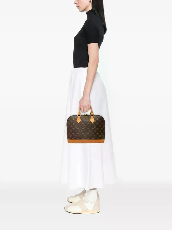 LOUIS VUITTON 2001 Monogram Alma Pm Handbag