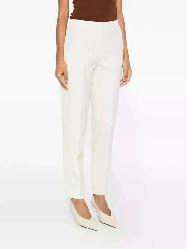 Liviana Conti Pressed-crease Slit-hem Trousers - Neutrals