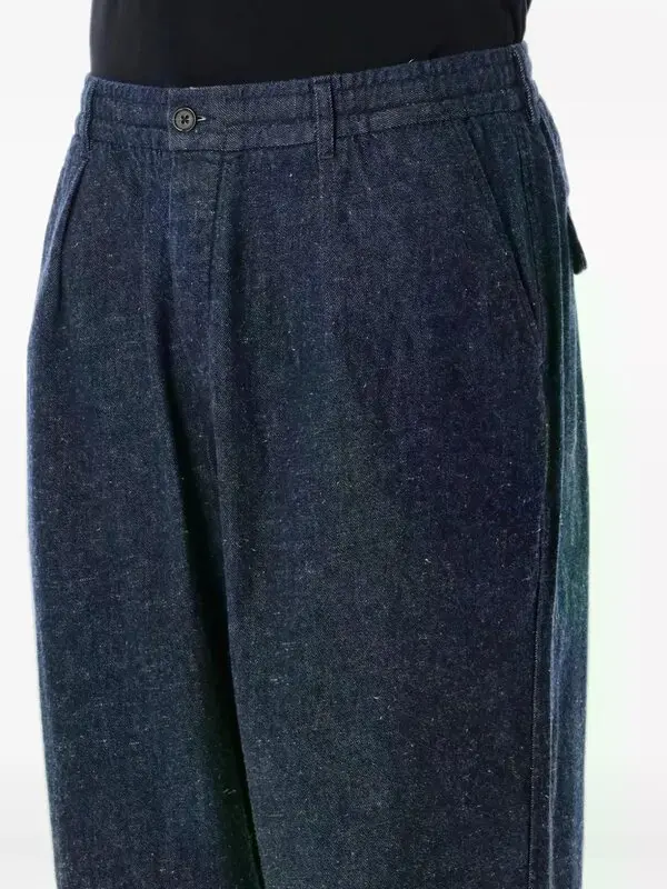 Universal Works Pleated Tapered-leg Trousers
