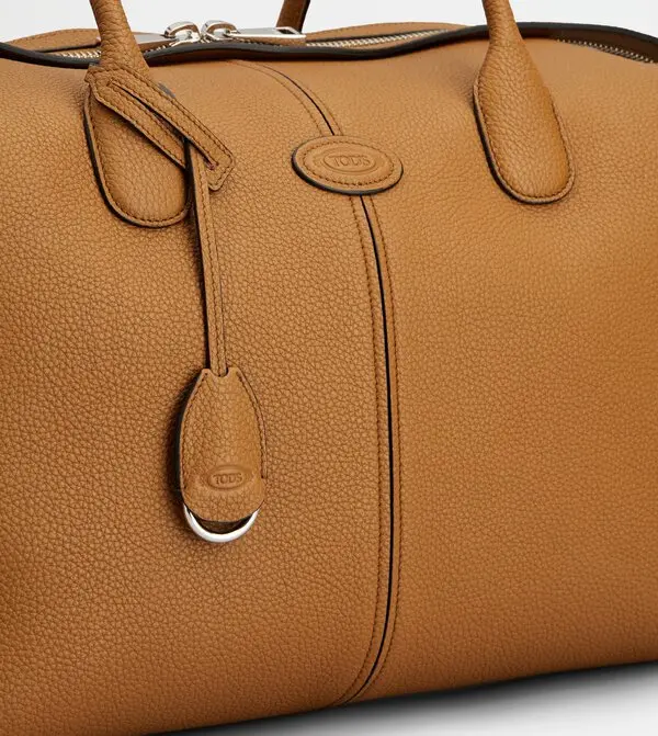 TOD'S Logo-patch Pebbled Duffle Bag