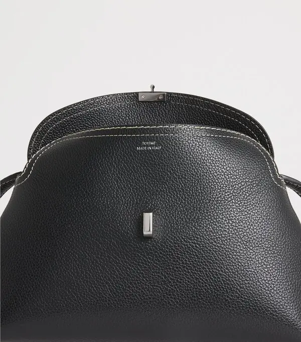 TOTEME Grained Leather T-lock Clutch Bag