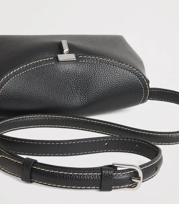 TOTEME Grained Leather T-lock Clutch Bag