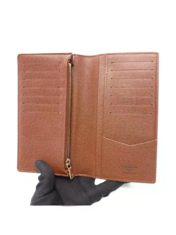 LOUIS VUITTON 2010 Columbus Monogram Bi-fold Long Wallet