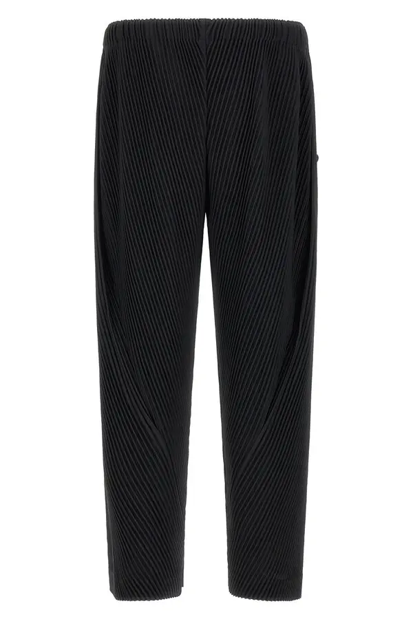 HOMME PLISSE' Slash Trousers