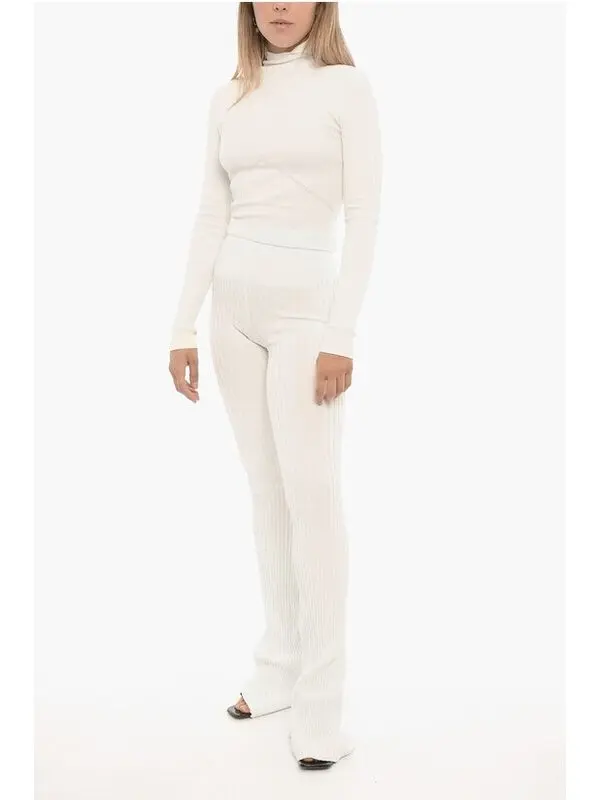 ANDREĀDAMO Ribbed-knit Flared Trousers