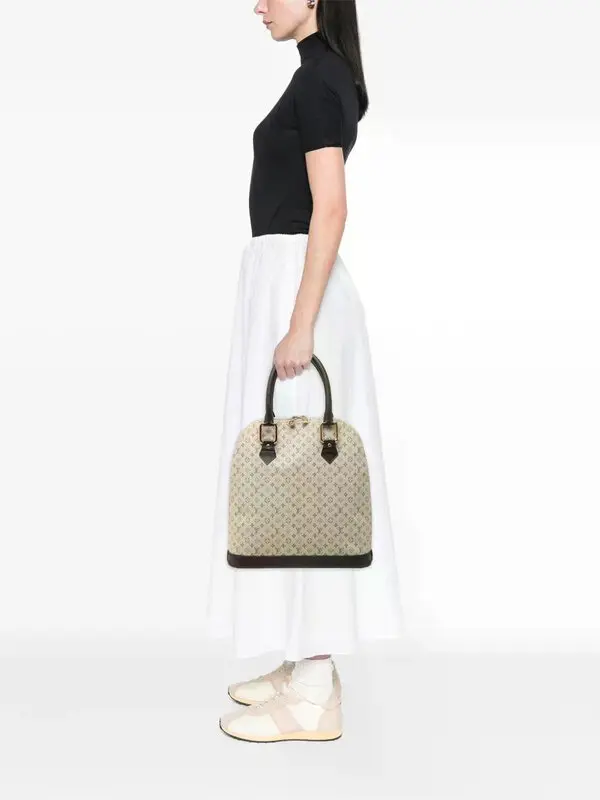 LOUIS VUITTON 2001 Monogram Mini Lin Alma Haut Handbag