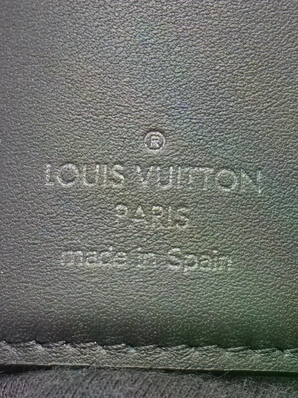 LOUIS VUITTON 2000-2026 Monogram Eclipse Reverse Discovery Wallet Small Wallets