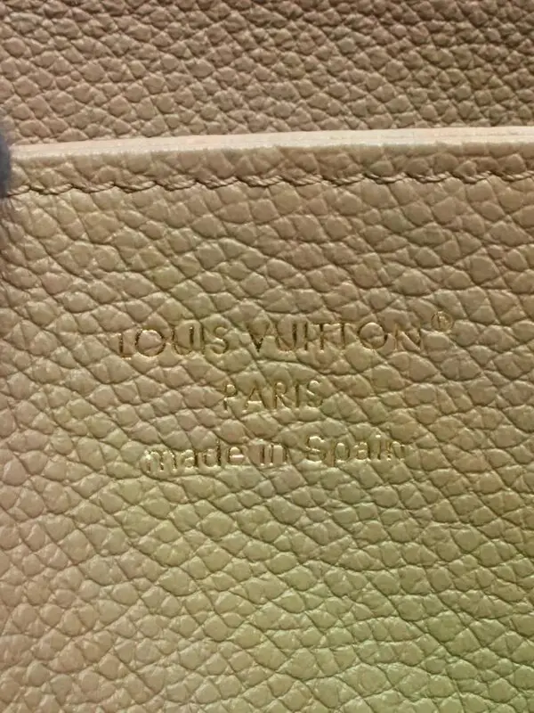 LOUIS VUITTON 2021-2026 Bicolor Monogram Empreinte Zippy Wallet Long Wallets