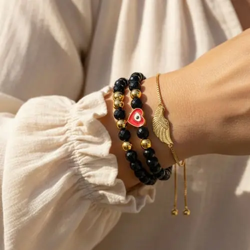 SEVEN SAINTS Onyx Heart Bracelet For Protection & Focus - Silver