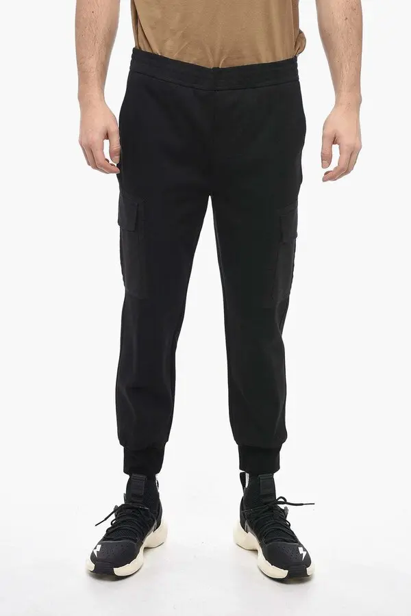 Neil Barrett Low-rise Skinny-fit Tapered Trousers - Black