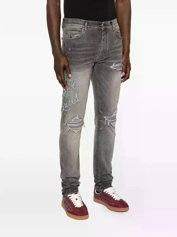 Amiri Ripped Embroidery Jeans