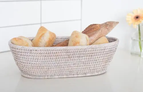 ARTIFACTS TRADING COMPANY™ Artifacts Rattan Oval Bread Basket - White Wash