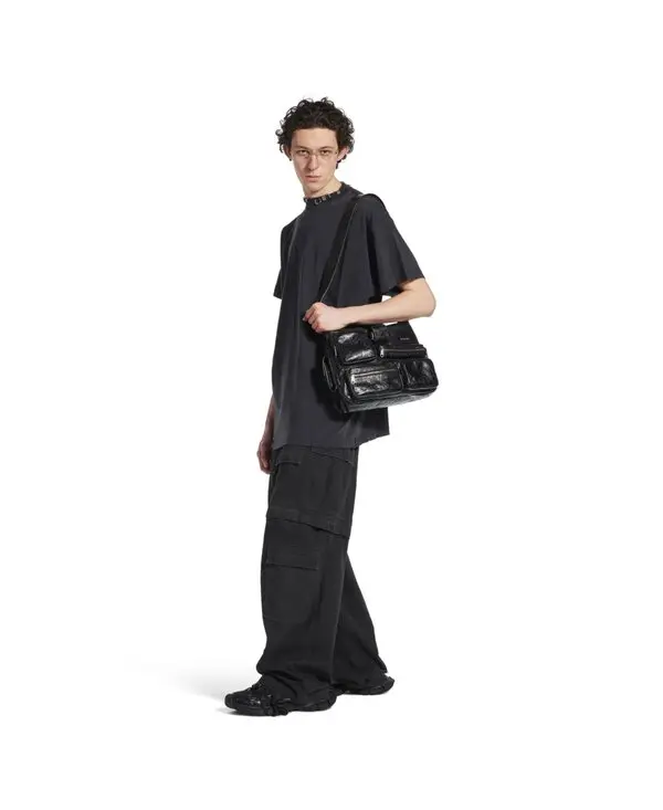 Balenciaga Pierced Arena Lambskin Messenger Bag - Black | Editorialist