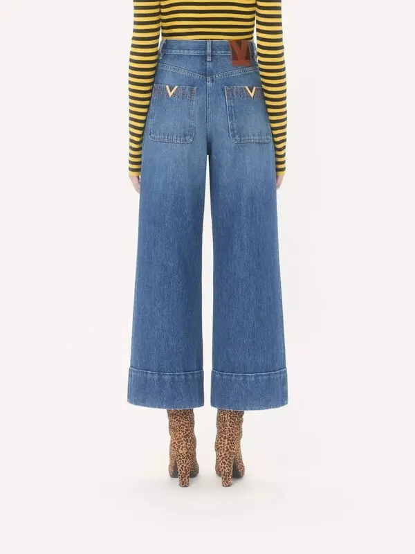 Valentino Garavani Denim Wide Leg Trousers With Cuffs