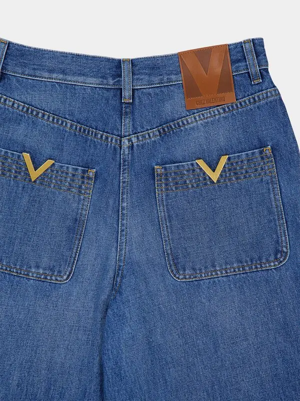 Valentino Garavani Denim Wide Leg Trousers With Cuffs