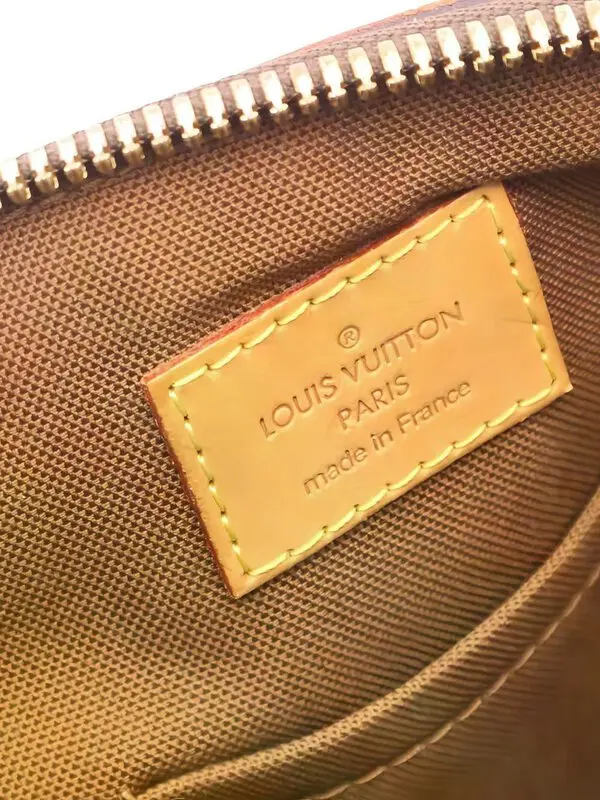 LOUIS VUITTON 2009 Tivoli Pm Monogram Tote