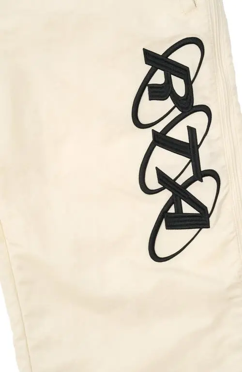 RtA Nixon Logo Track Pants - Raw Sand