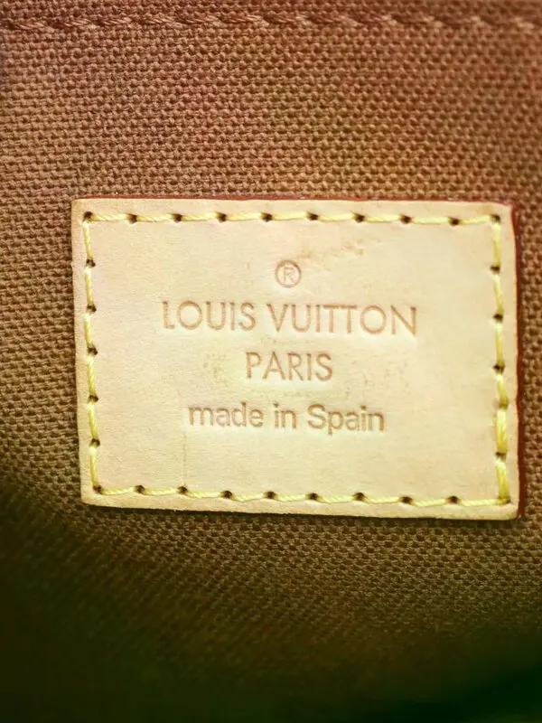 LOUIS VUITTON 2011 Monogram Odeon Pm