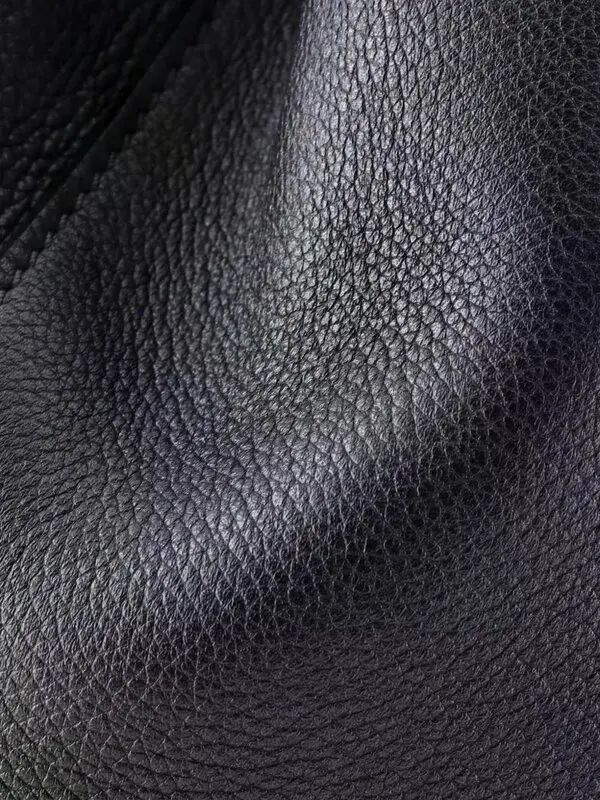 LOUIS VUITTON Lockme Eyelet Leather Backpack