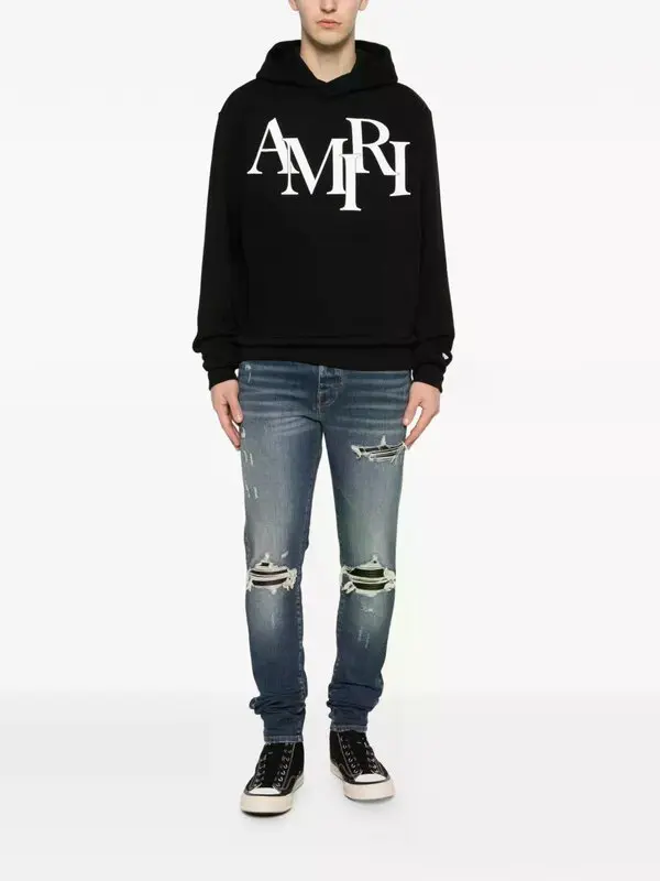 Amiri Ripped-effect Jeans