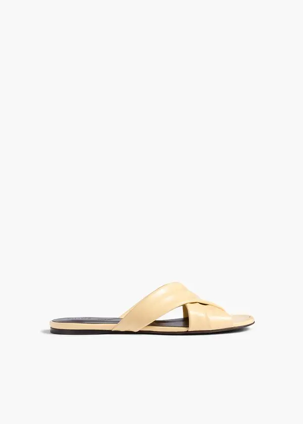 Khaite Liria Flat Sandal In Glazed Leather - Butter