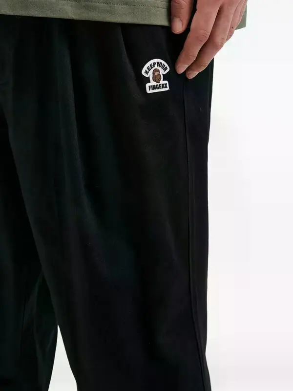 FINGERCROXX Elasticated-waistband Logo-patch Trousers