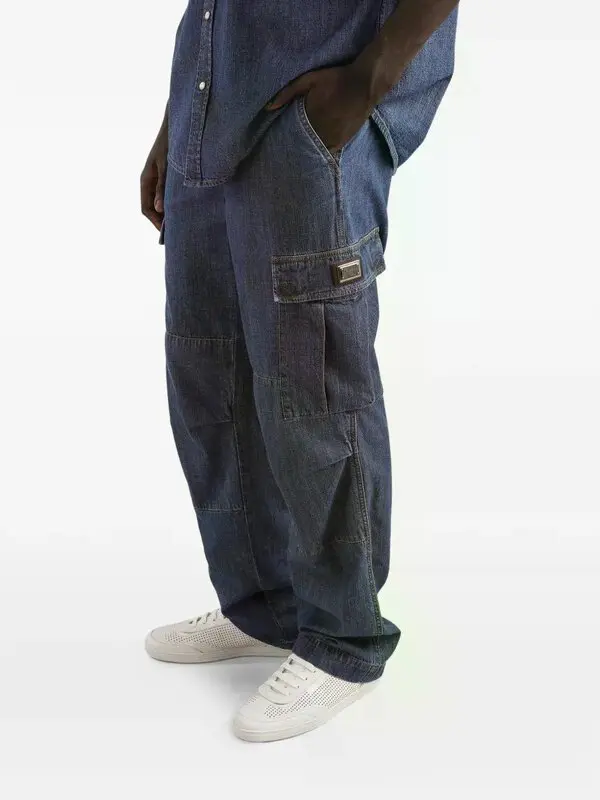 Dolce & Gabbana Elasticated Denim Trousers With Plaque Detail