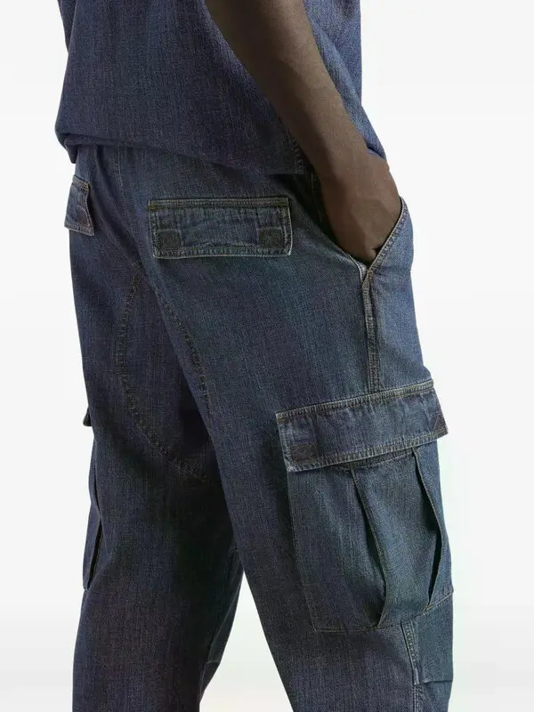 Dolce & Gabbana Elasticated Denim Trousers With Plaque Detail
