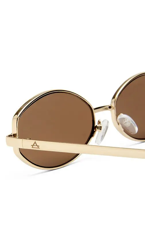 AIRE Objective Sunglasses In Metallic Gold