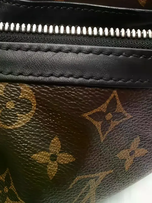 LOUIS VUITTON 2010s Discovery Monogram Leather Backpack