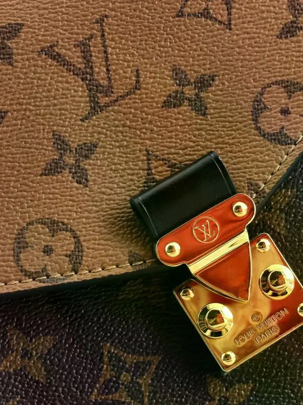 LOUIS VUITTON Pochette Metis Reverse Monogram Canvas Crossbody Bag - Brown