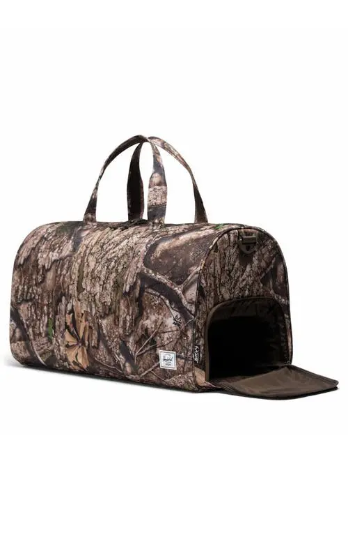 Herschel Supply Co. Novel Duffle Bag - Realtree Apx Camo