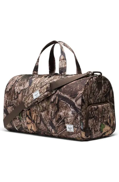 Herschel Supply Co. Novel Duffle Bag - Realtree Apx Camo