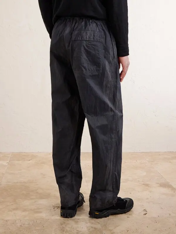 Stone Island Tapered Logo-appliquéd Reflective Nylon Trousers