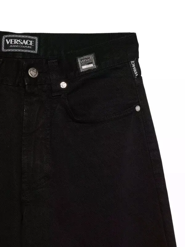 Versace 1990s Logo-patch Trousers