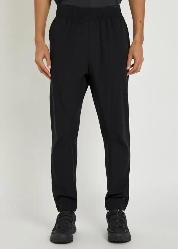 NOW YOU LIVE Saxby Tapered-leg Shell Sweatpants - Black