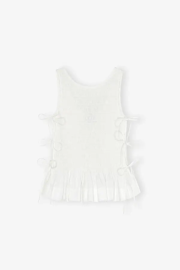 GANNI Sleeveless Smocked Top With Side Ties And Ruffled Hem - White