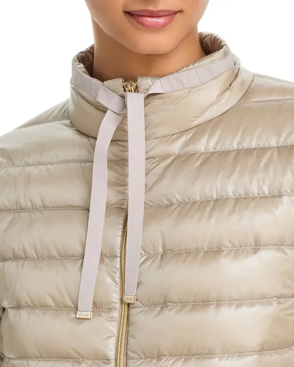Herno Quilted Ruffle Hem Coat