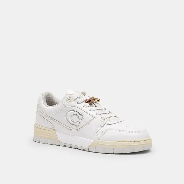 COACH Bow Shoelace Charm - Brass/pink